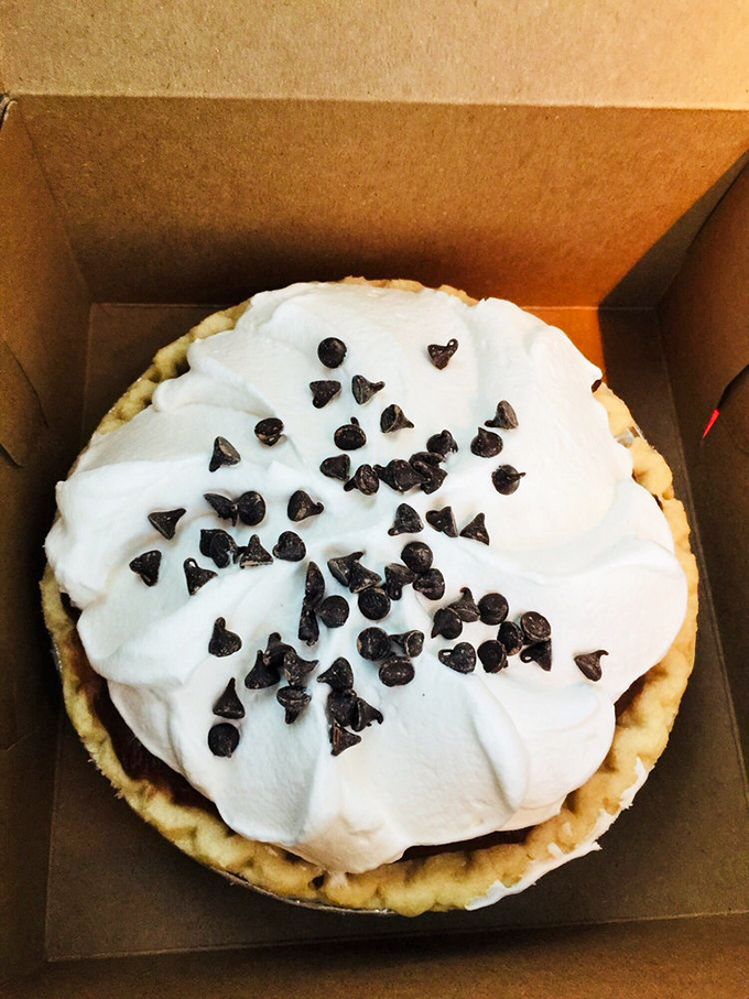 This cream pie isn't playing around&mdash;chocolate chips standing at attention on a pillowy white landscape of pure dessert joy.