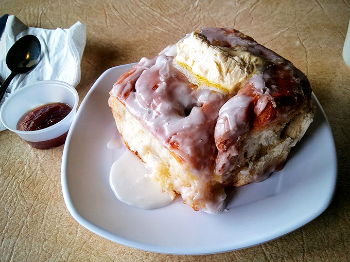 The famous cinnamon roll isn't just big; it's architectural&mdash;a spiral masterpiece of dough, cinnamon, and glaze that demands respect.