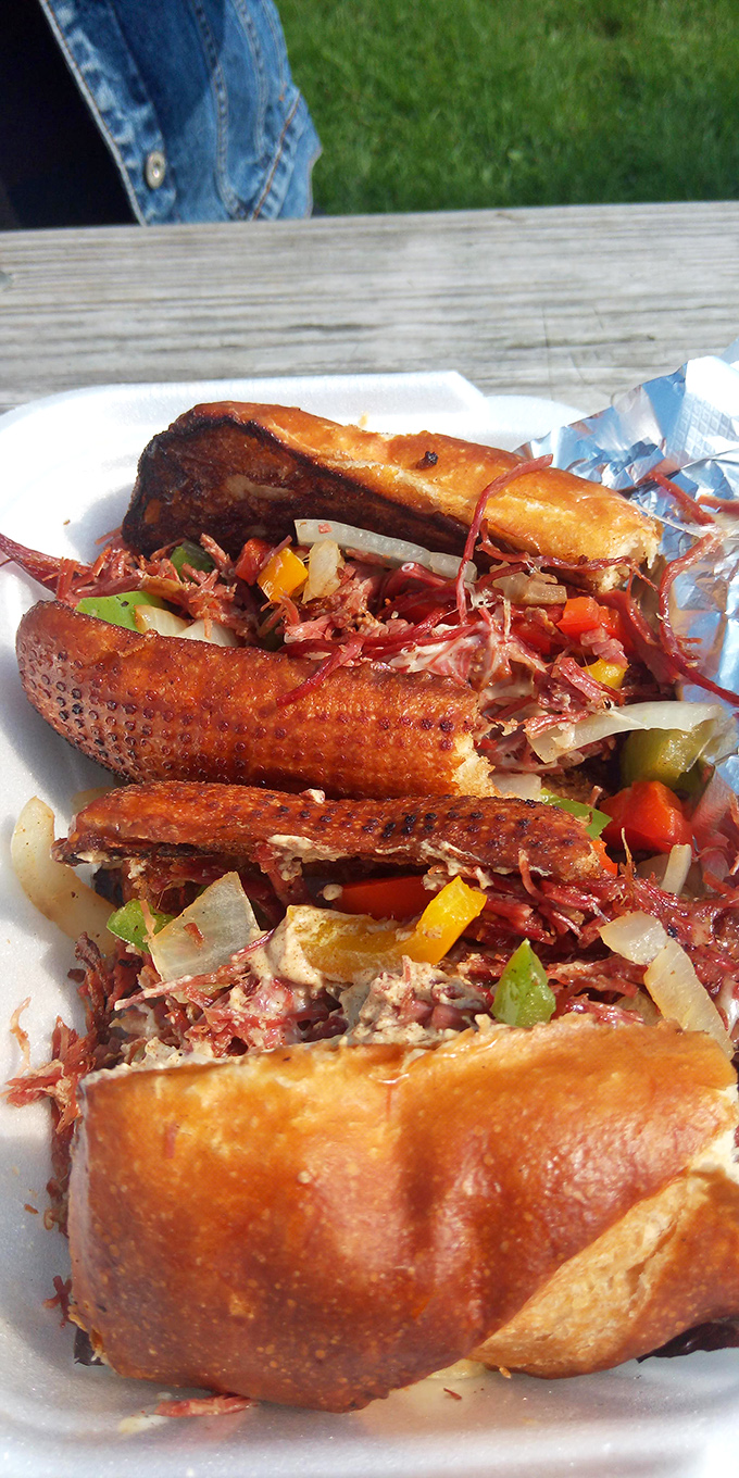 This isn't just a sandwich&mdash;it's an engineering marvel of corned beef, vegetables, and bread that somehow defies the laws of structural integrity.