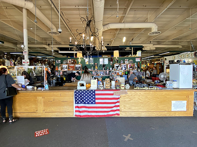 Entry to the time portal&mdash;American flag proudly displayed at the information desk where your journey into yesteryear officially begins.