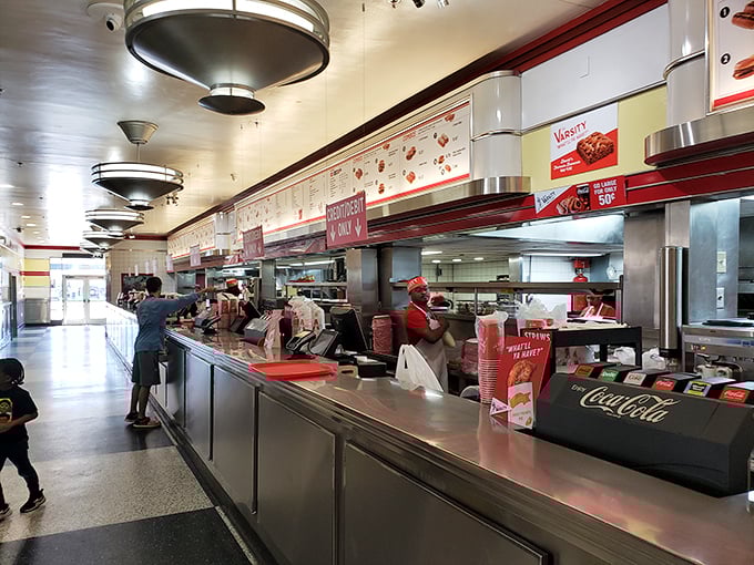 The counter stretches like a runway of culinary possibilities, where the magic words "What'll ya have?" launch countless food adventures daily.