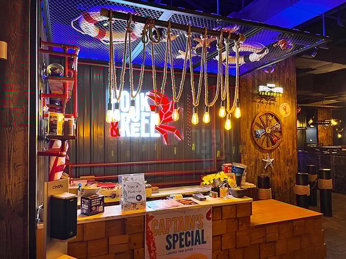 The host station welcomes you with nautical flair and rope lighting. Your seafood adventure begins with "Ahoy" rather than "Hello."