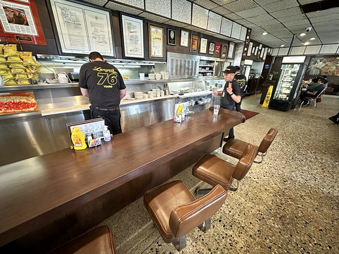 The counter at Langer's&mdash;where sandwich artistry happens before your eyes and deli dreams come true.