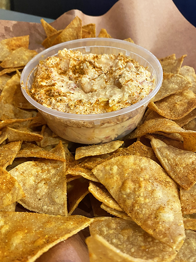 This crab dip surrounded by seasoned tortilla chips isn't just an appetizer&mdash;it's Delaware's coastal influence making a delicious cameo at the barbecue table.
