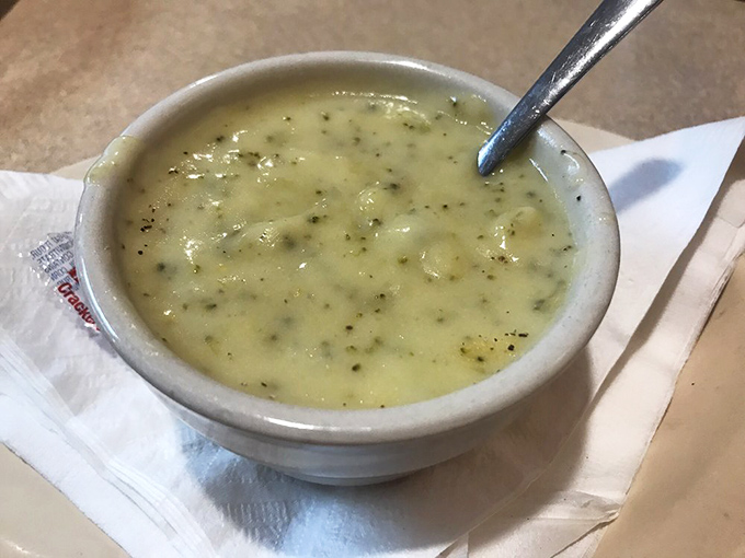 A bowl of cream of broccoli soup that proves vegetables can be comforting too, especially when they've met heavy cream and butter.