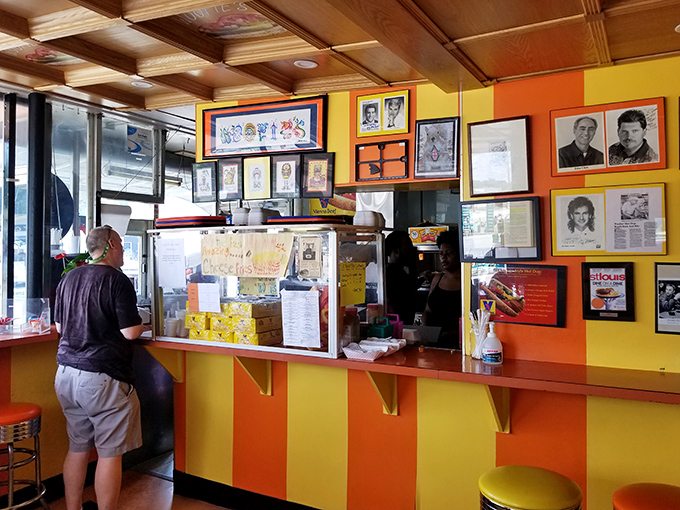 The anticipation on this customer's face says everything. Like waiting for concert tickets in the '70s, but the reward is more immediate and involves mustard.