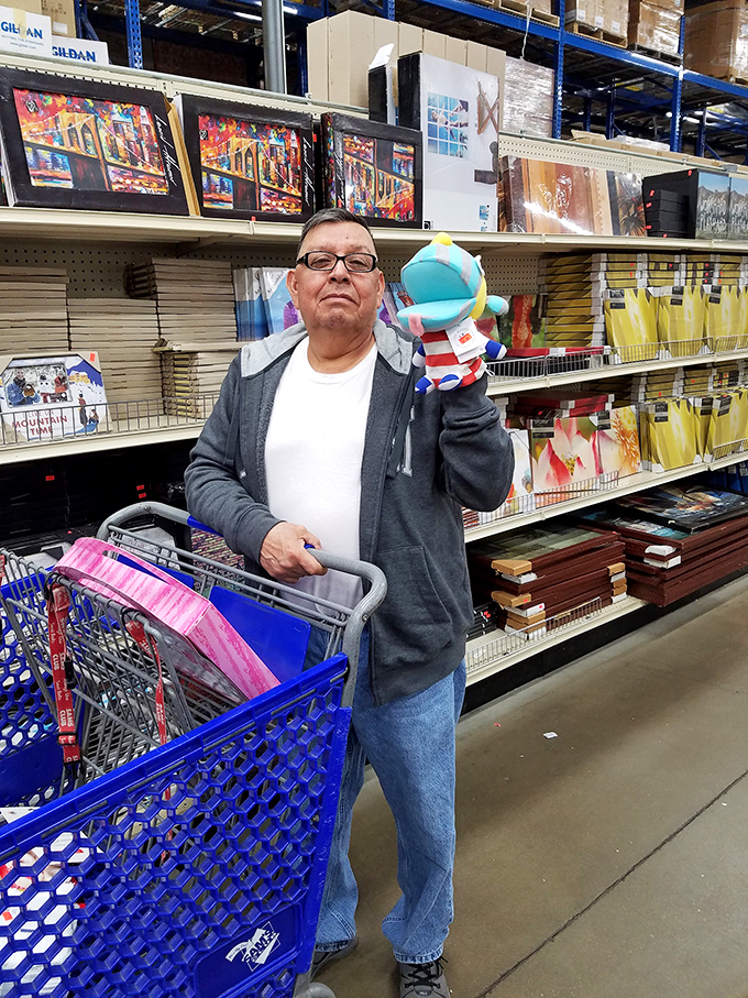 A jolly shopper in the store examining merchandise, demonstrating the diverse customer base that Bailey's attracts with its wide selection and value pricing.