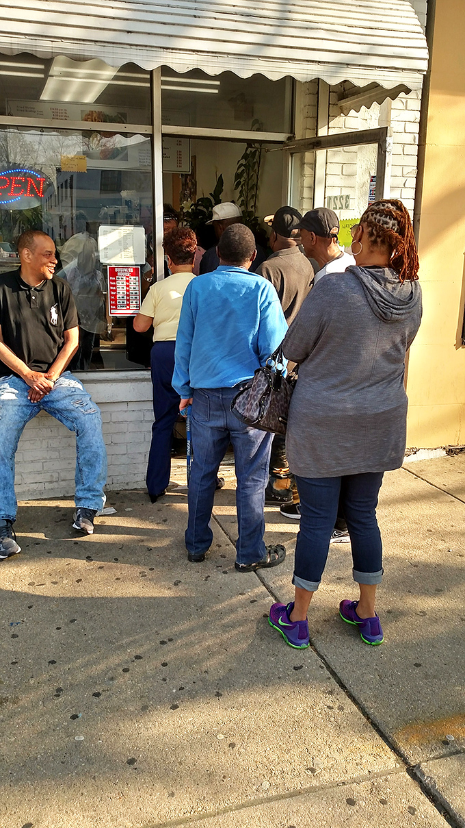 The line forms early for Maryland's seafood treasures. When people queue up like this, you know something special awaits inside.