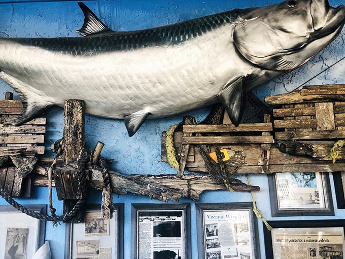 That mounted fish has seen more celebrations, first dates, and family reunions than most wedding photographers.