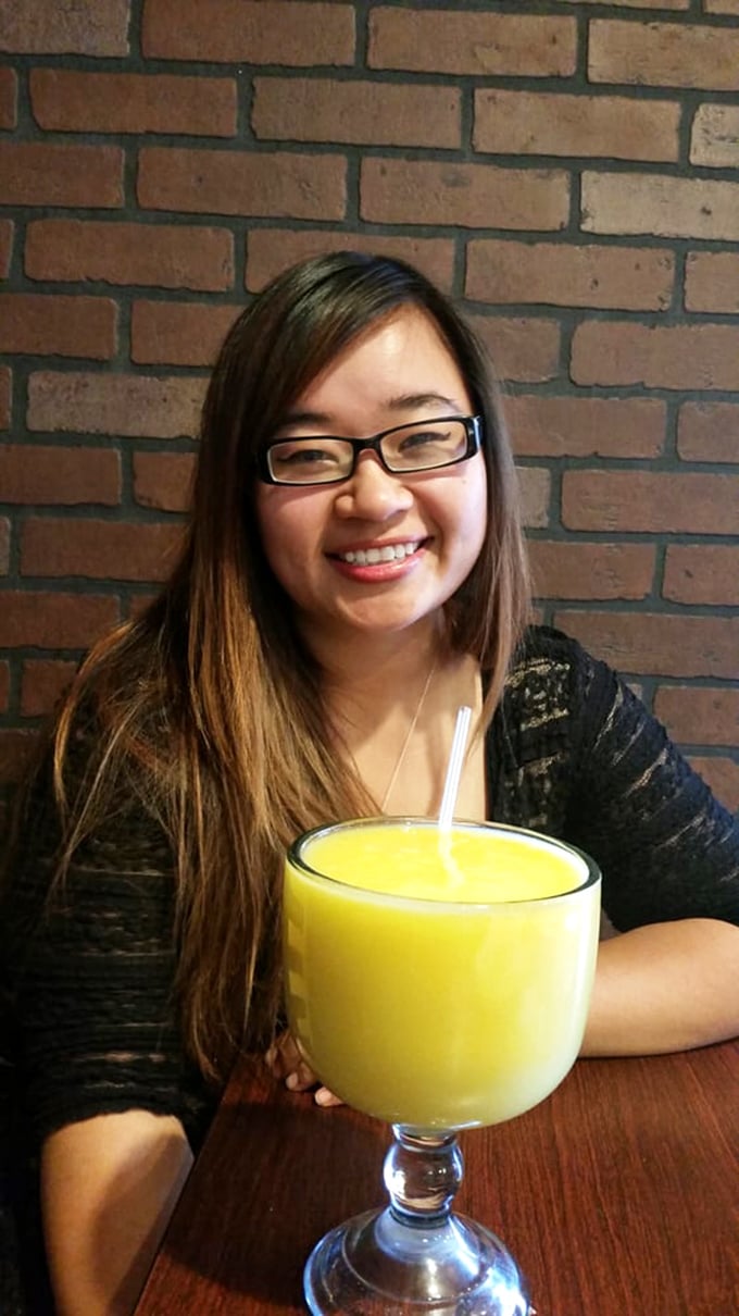 The look of pure joy that comes from knowing you're about to enjoy something spectacular. That horchata is practically glowing with promise.