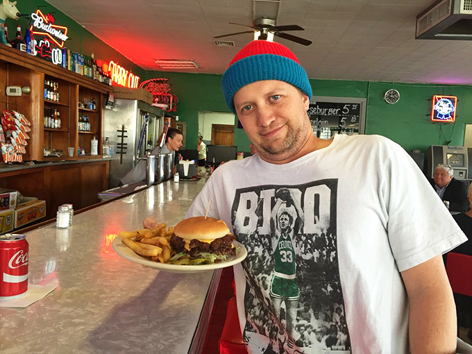 The look of someone who's about to have a religious experience disguised as lunch. That smile says it all.