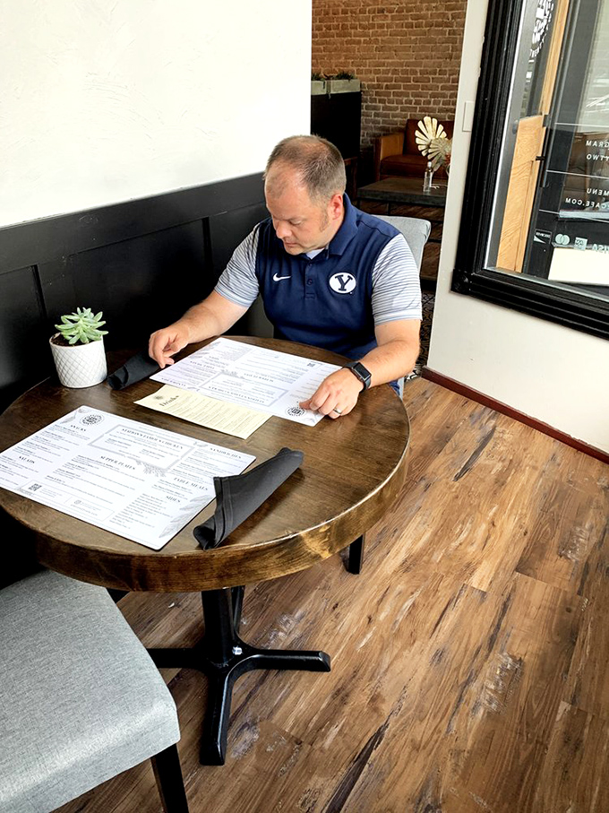 Even the menus deserve your full attention at Station 22. This diner knows he's about to embark on a culinary journey worth the BYU polo shirt he wore.