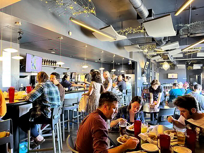 A bustling dining room filled with the happiest people in Albuquerque. When food is this good, strangers become a community.