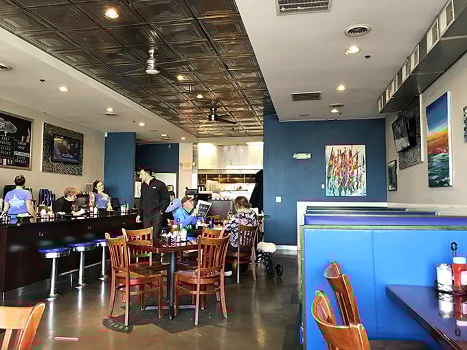 Where strangers become neighbors over coffee and conversation. The blue booths have heard more Baltimore stories than any therapist in town.