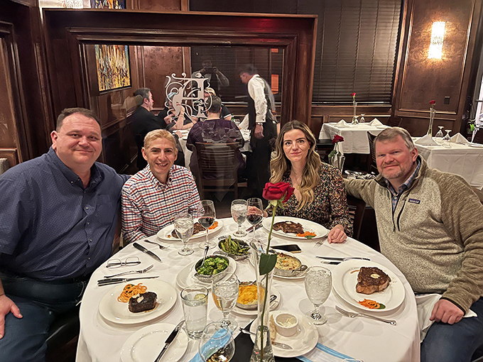 Great steakhouses create memories around tables, not just meals. These diners are mid-way through an evening they'll be talking about tomorrow.