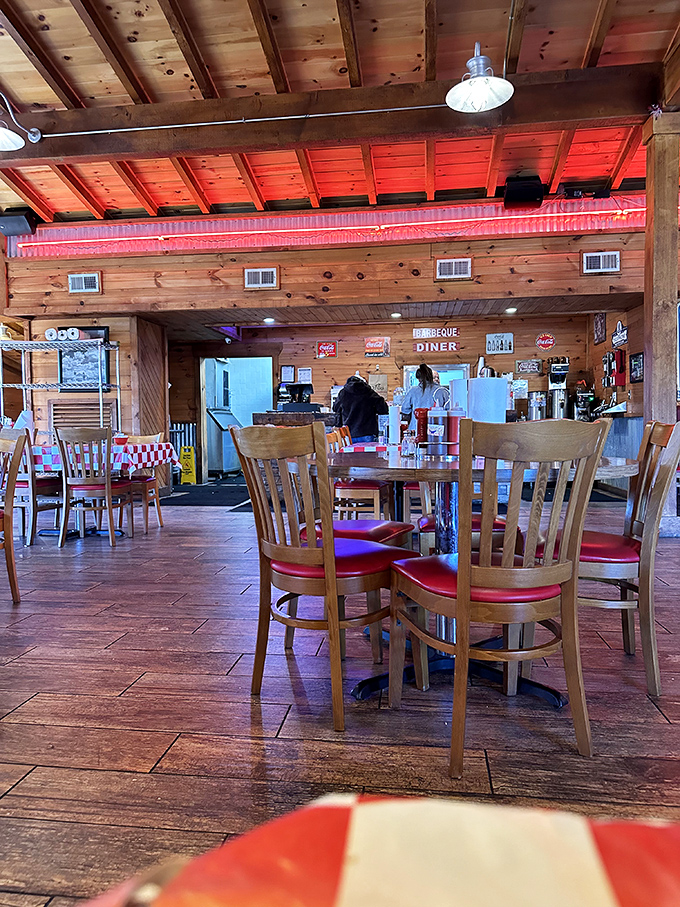 Morning light streams through the windows, illuminating empty tables that won't stay that way for long. The calm before the barbecue storm.