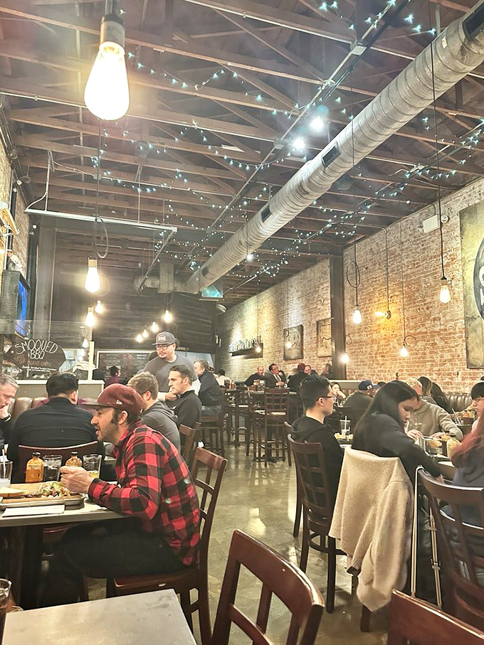 A dining room buzzing with the universal language of "mmm" and "pass the sauce" &ndash; where strangers become friends over shared love of meat.