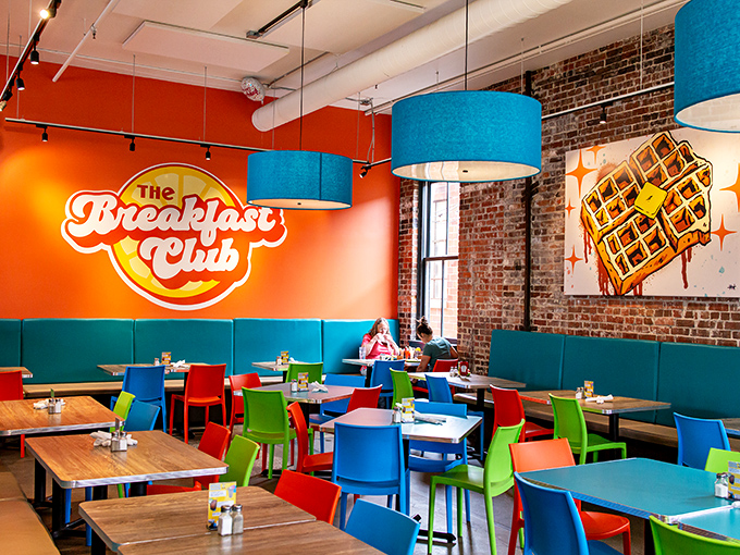 The dining room's rainbow of chairs suggests you're about to experience breakfast that's anything but ordinary.