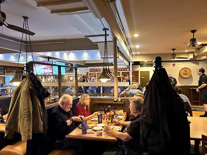 The dining room buzzes with the universal language of barbecue appreciation&mdash;forks pausing mid-air as diners contemplate whether to take another bite or just propose marriage to their plate.