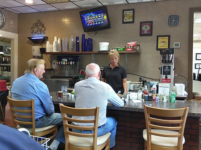The dining room hums with conversation as families and friends gather around tables where memories are made between coffee refills.
