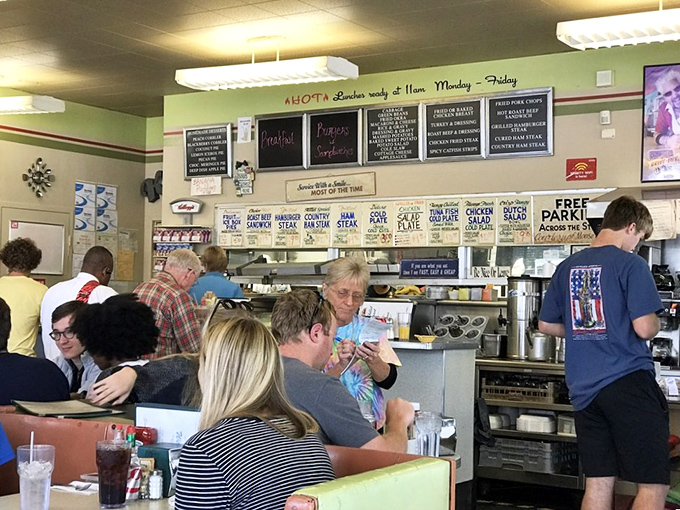 A typical morning scene: locals and visitors alike huddled over plates of breakfast goodness, creating memories one bite at a time.