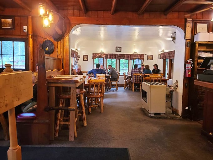 The dining room where strangers become friends over coffee and pie&mdash;wooden beams overhead witnessing decades of "just one more bite."