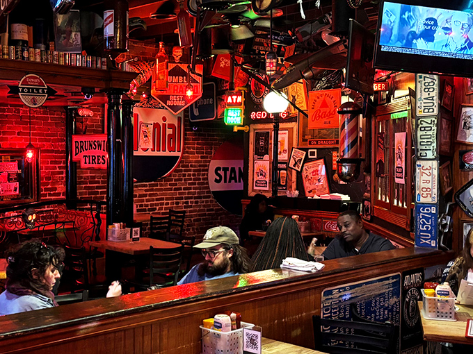 The dining area feels like your coolest friend's basement&mdash;if that friend collected vintage signs and served life-changing burgers between stories.