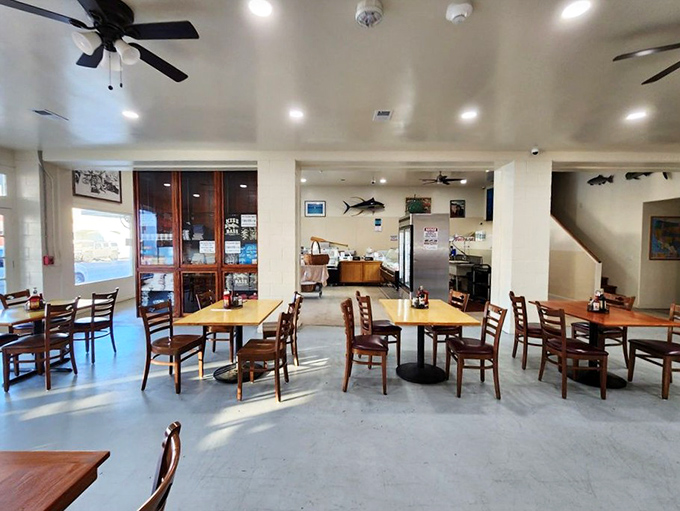 Simple wooden tables and chairs in this bright, airy space let you focus on what's important&mdash;the seafood that will soon occupy every square inch.