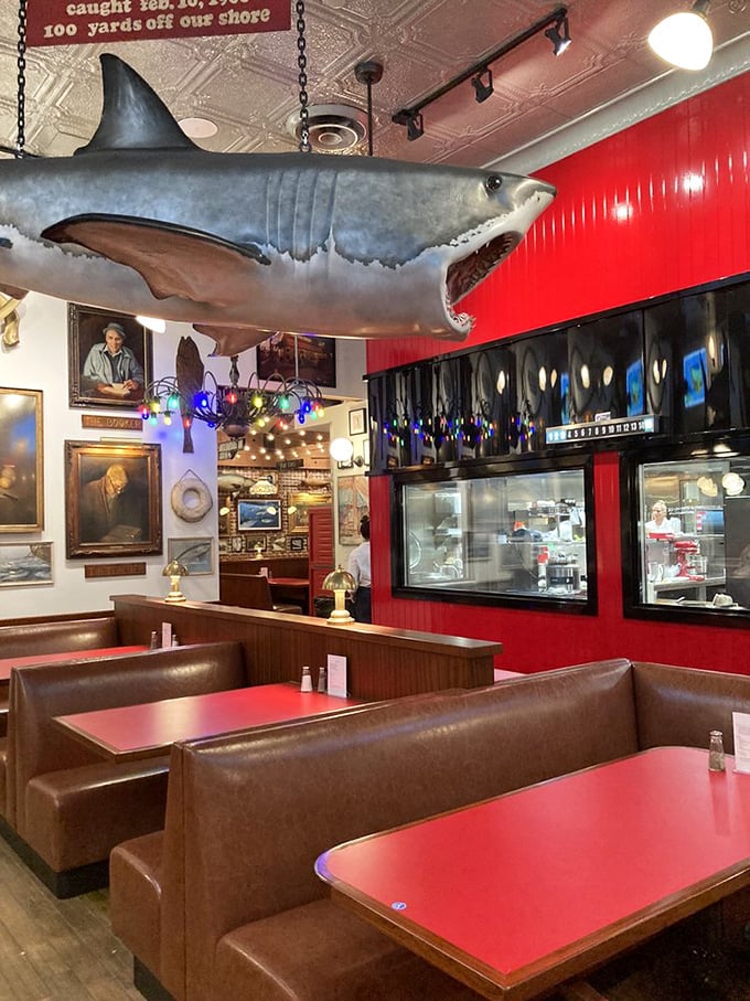That suspended shark isn't decoration&mdash;it's keeping an eye on anyone who might leave without trying the crab cakes.