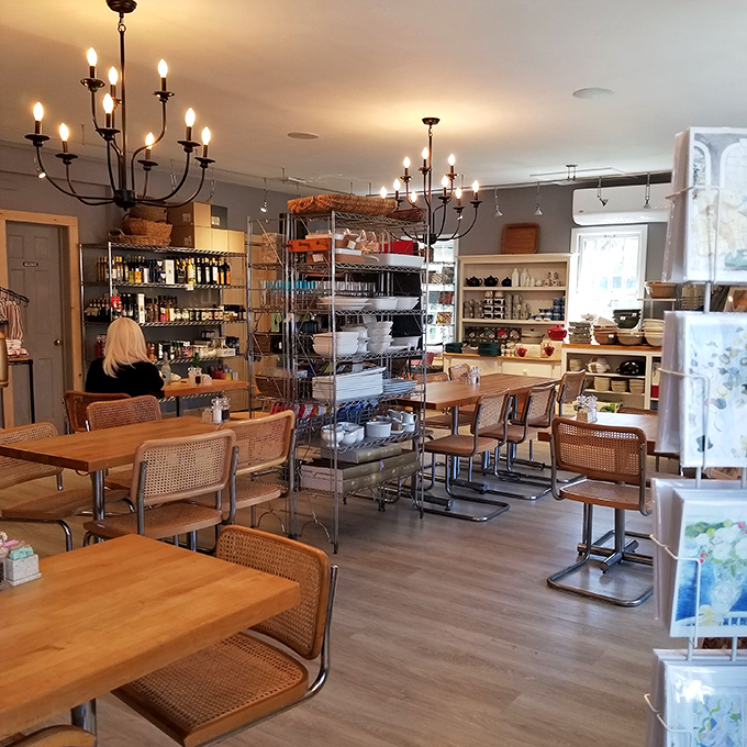 Wooden tables, cane chairs, and elegant chandeliers create that rare space where you want to linger long after your plate is clean.