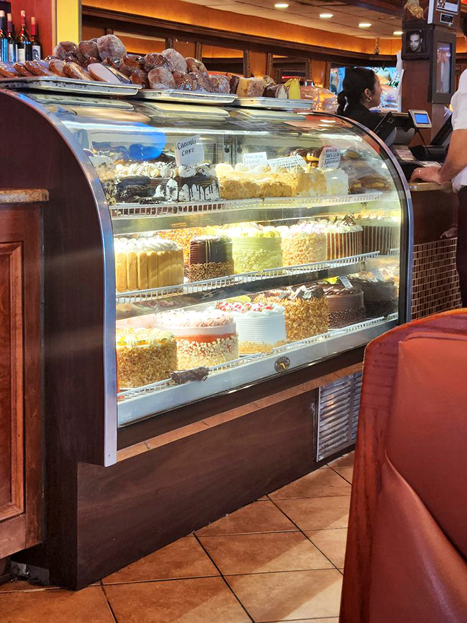 The dessert case&mdash;where willpower goes to die. Each cake and pastry silently chanting "resistance is futile" as you walk by.