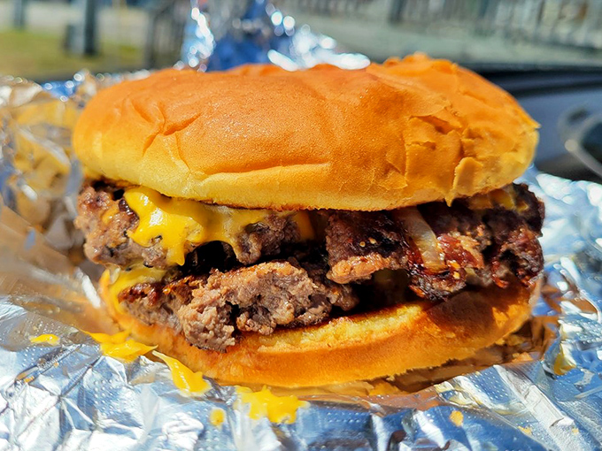 The double cheeseburger that makes you question all your previous relationships with food. Worth every napkin you'll need.