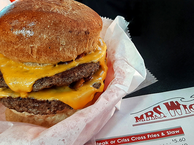 A cheeseburger that demands a two-handed commitment and possibly expandable pants. This isn't fast food; it's slow, deliberate deliciousness.