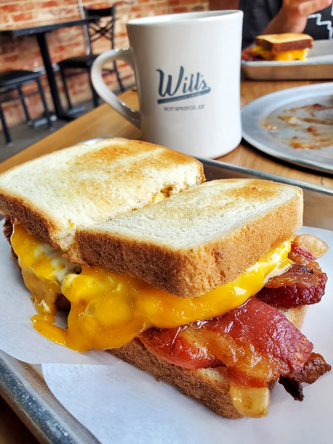 This isn't just a sandwich &ndash; it's architecture. Golden toast supporting the perfect balance of melty cheese and crispy bacon in harmonious breakfast bliss.