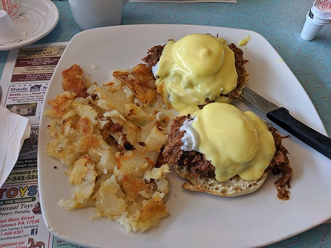 Eggs Benedict: where hollandaise sauce flows like liquid gold over perfectly poached eggs&mdash;breakfast's answer to formal wear. 
