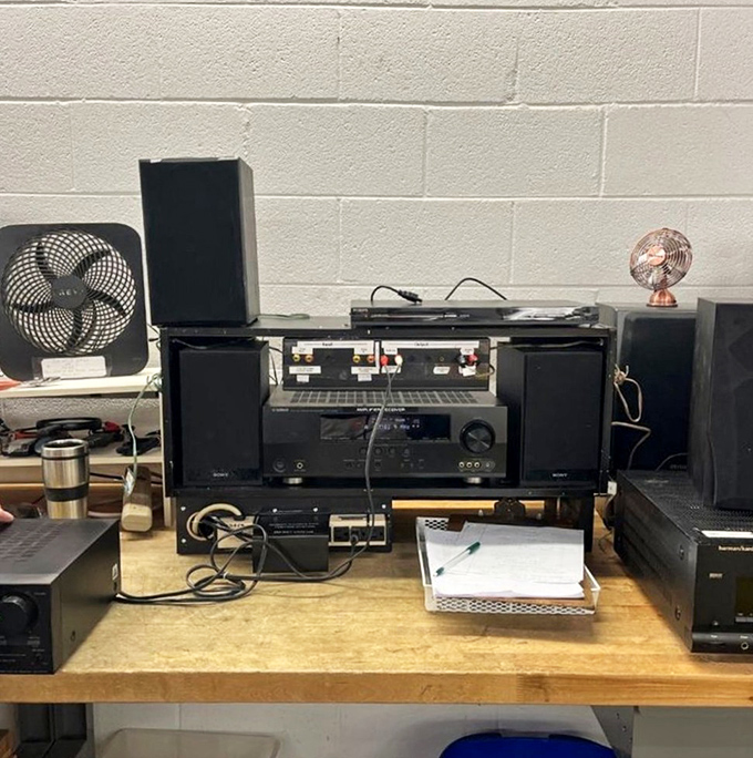 The electronics testing station ensures that vintage audio equipment, speakers, and media players work before finding new homes with music enthusiasts.
