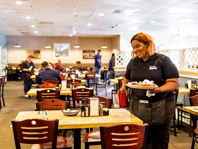 The smile that delivers your food says it all&mdash;pride in every plate that leaves the kitchen. Service with genuine warmth beats fancy uniforms any day.