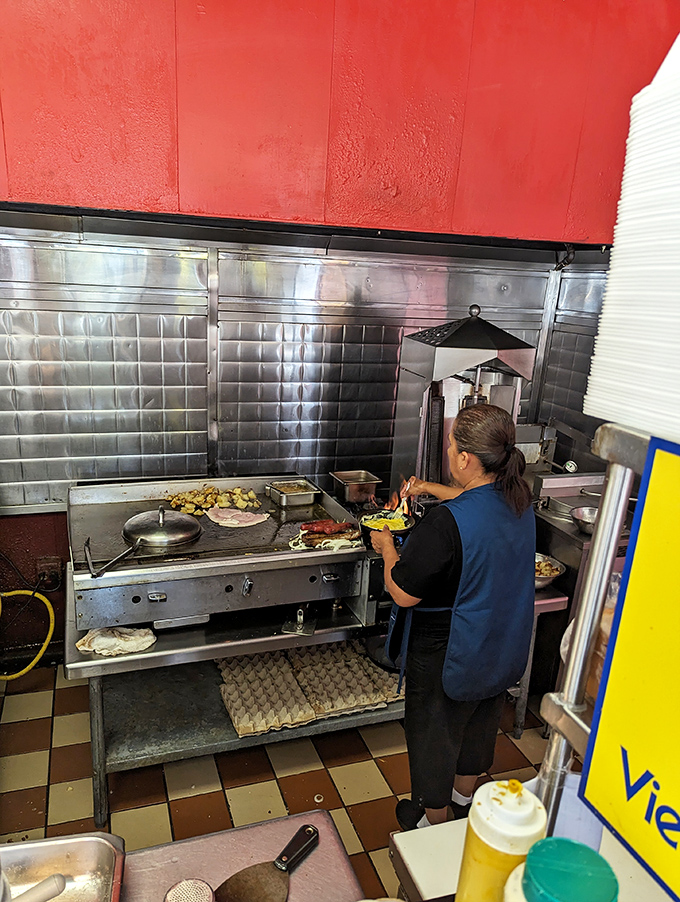 Behind every perfect hot dog is someone who's mastered the art of assembly, turning ingredients into edible architecture.