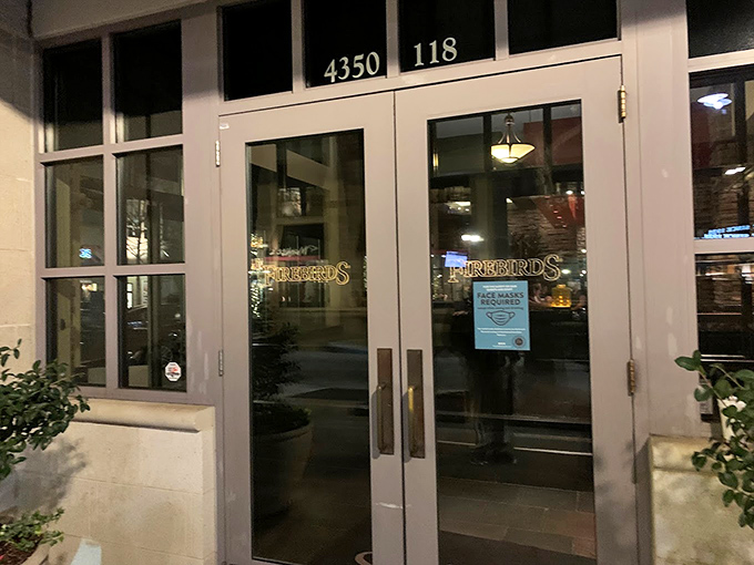 The entrance promises what awaits inside: a refuge from ordinary dining. Those double doors lead to your new favorite restaurant discovery.