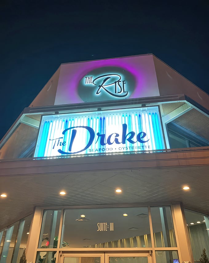 As night falls, The Drake transforms into a neon-lit beacon of culinary promise&mdash;like a lighthouse guiding hungry souls to safe harbor.