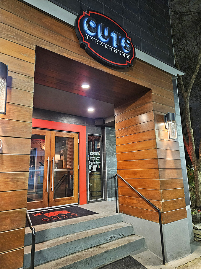 As evening falls, the red door beckons like a portal to a world where everyday concerns take a backseat to culinary pleasure.