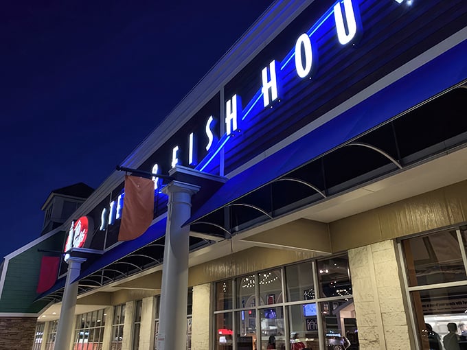 As night falls, the blue glow of Two Rivers beckons like a lighthouse guiding hungry sailors to safe, delicious harbor.