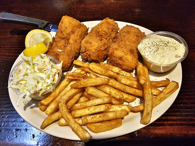 Fish so perfectly golden and crisp you'd never guess you're miles from any ocean, served with fries that could make a potato proud.