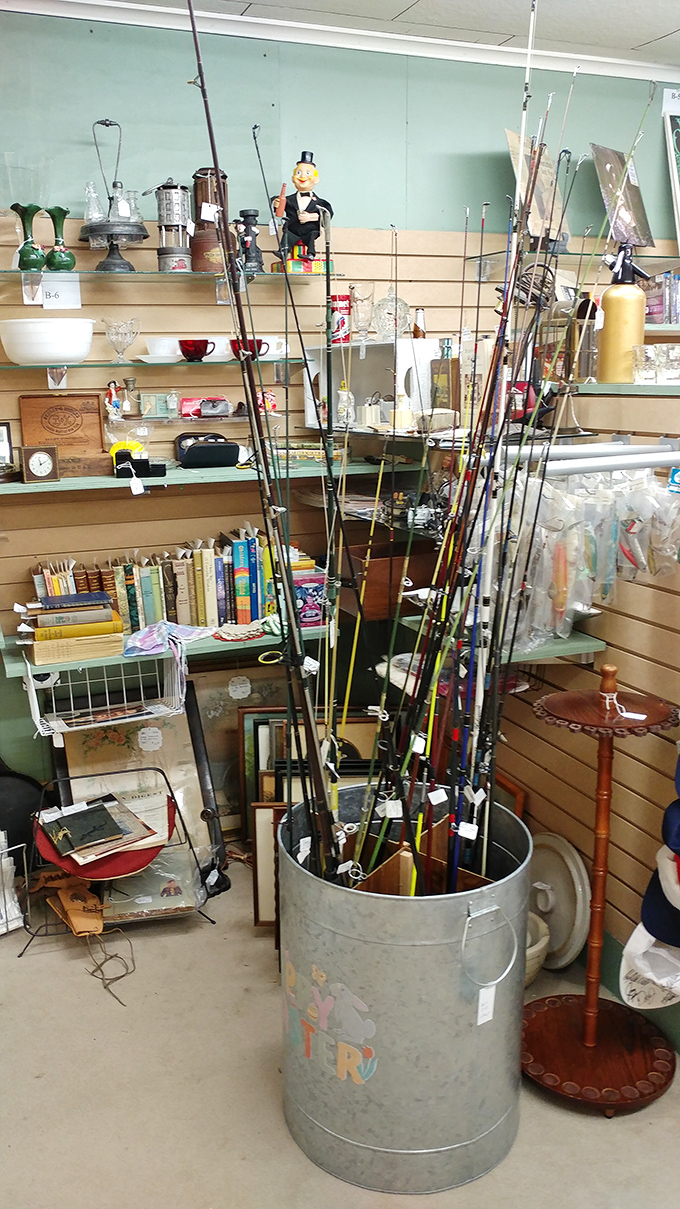 Fishing poles stand like sentinels in a galvanized bucket, waiting for their next adventure. Hemingway would approve of this old man's sea of angling options.