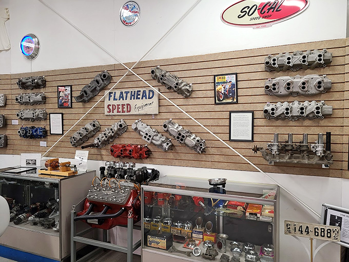 Speed equipment heaven: The wall of flathead V-8 parts showcases how Americans have always loved making fast things go even faster. Gearhead paradise.