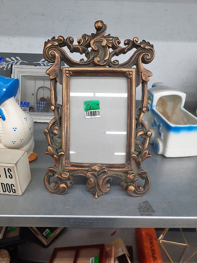 An empty ornate frame that's anything but empty of potential. Your memories deserve this level of baroque splendor!