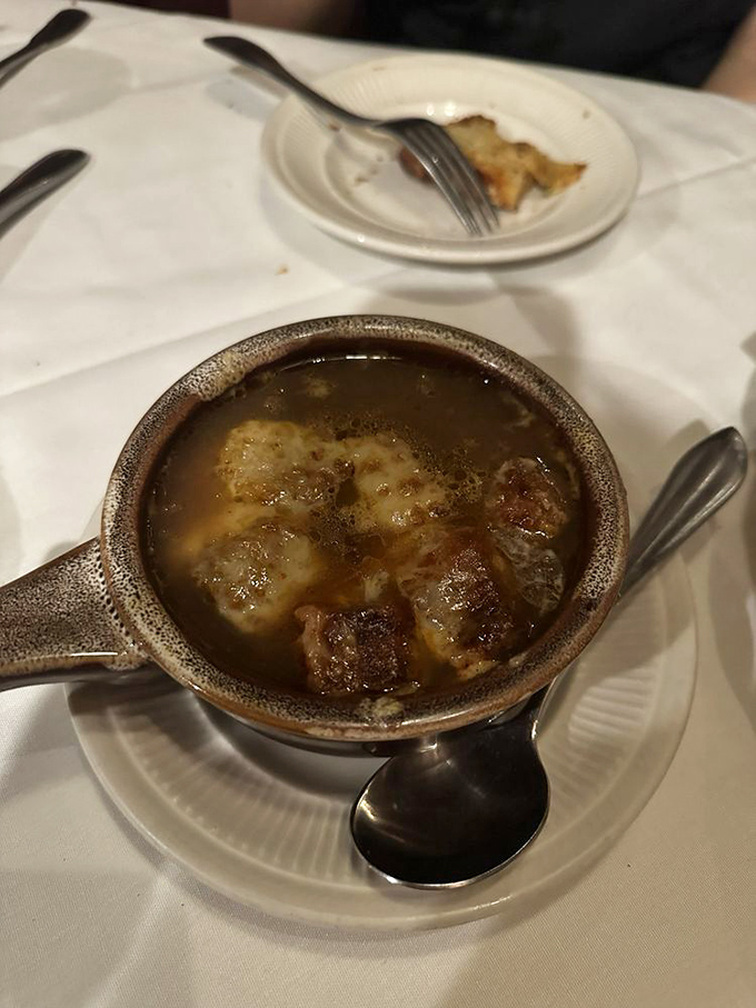French onion soup that's worth the inevitable string of cheese that will dangle from your chin to the bowl. Some moments transcend dignity.
