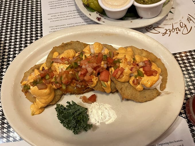 Fried green tomatoes topped with what can only be described as seafood confetti. Southern tradition meets Gulf Coast luxury on a single plate.