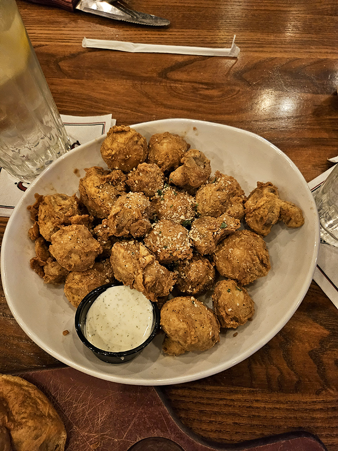 These fried mushrooms aren't just appetizers; they're little golden orbs of joy that make waiting for your steak a pleasure, not a chore.