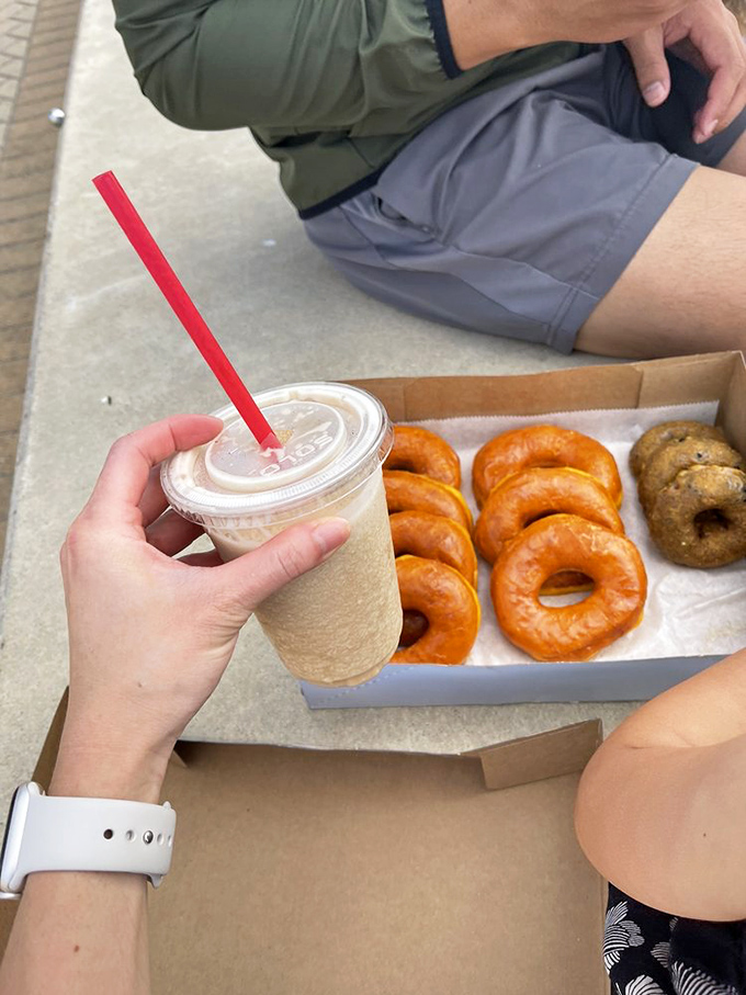 The ultimate pairing: cold coffee and warm donuts. Some relationships are just meant to be, especially when enjoyed outdoors on a Texas morning.